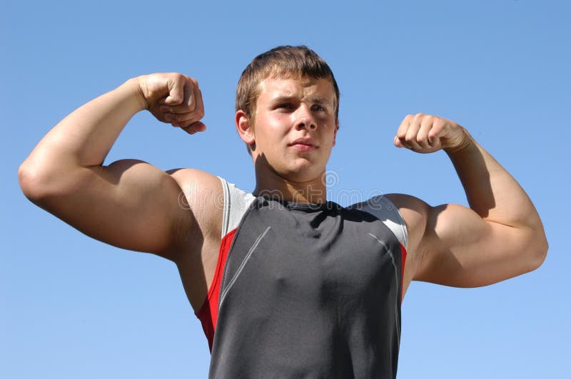 Flexing Biceps stock photo. Image of attractive, look - 1731296