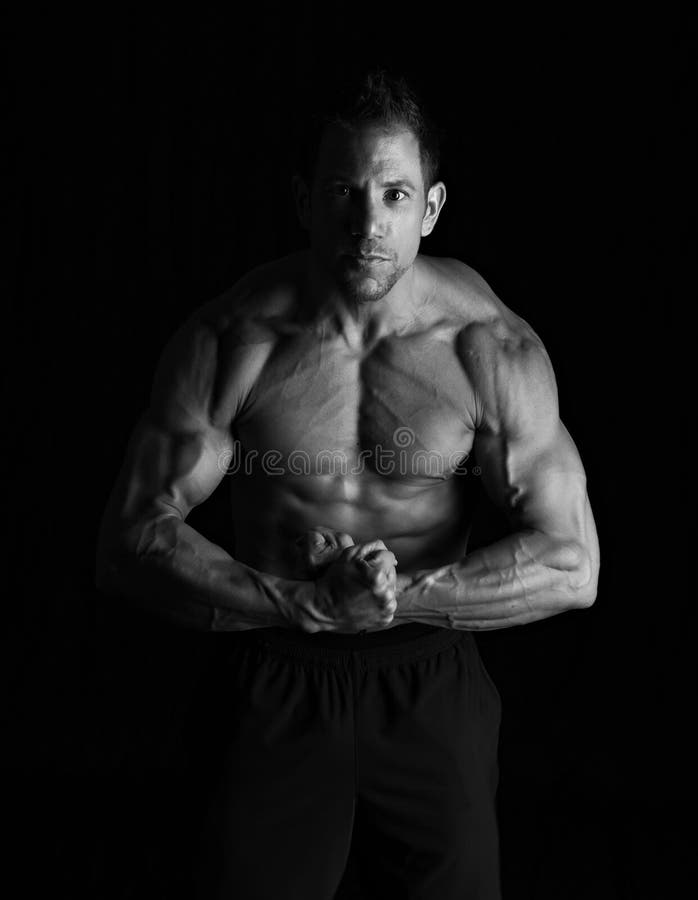 Strong fitness man flexing stock photo. Image of muscle - 32165036
