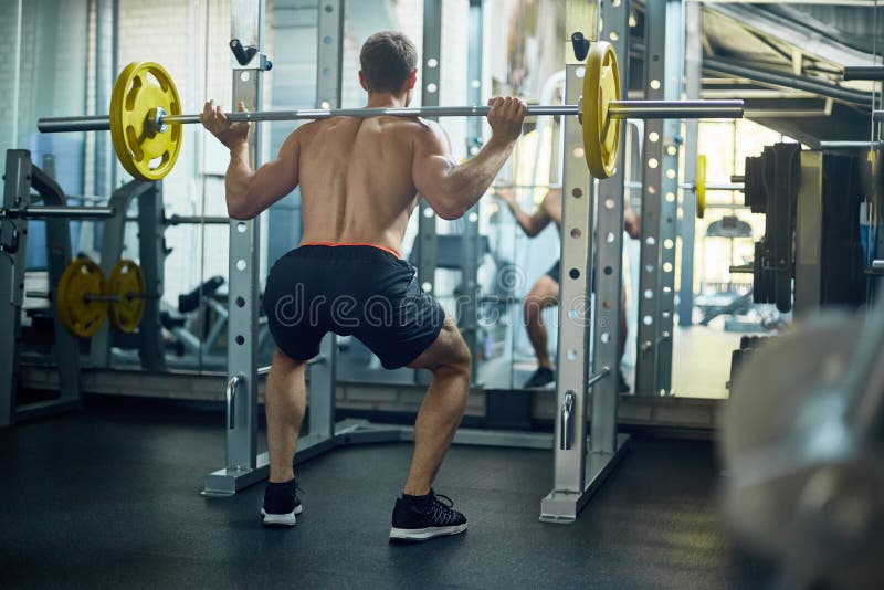 Flexing Muscles with Barbell Stock Image - Image of muscular, sportsman ...