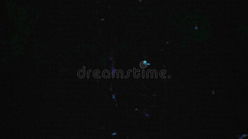 Flickers in the Dark: Glowing Dust Particles in a Cosmic Void Stock ...