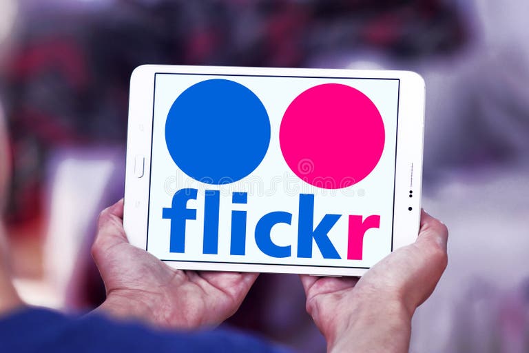 Flickr logo editorial stock photo. Image of phones, hands - 94090173
