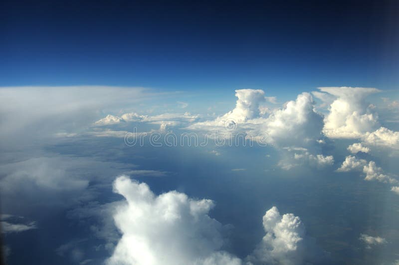 Flight in an Airplane Above the Clouds, Skyline, Sky Line Stock Image ...