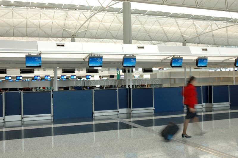 Flight Attendant Walking through the Check-in Counter Stock Image ...