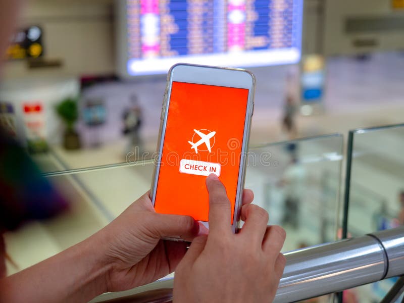 Flight Check-in by Mobile Phone. Hand Touching on Smartphone Screen To ...