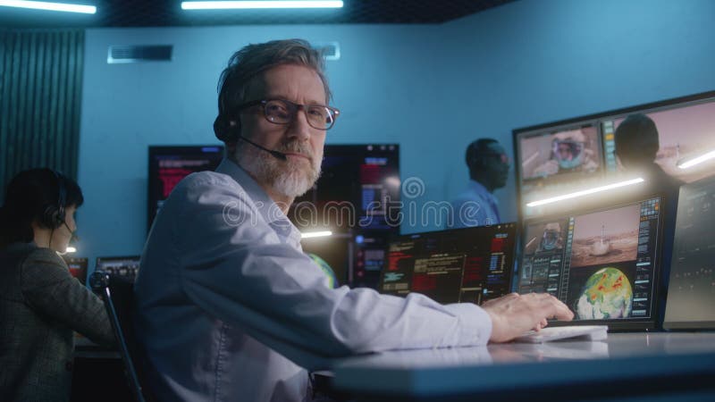 Flight Control Employee in Headset Looks at Camera Stock Video - Video ...