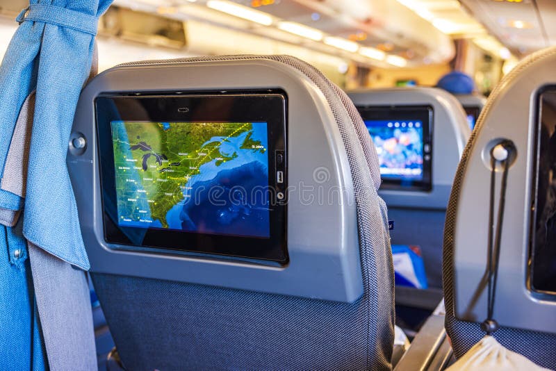 In-flight Entertainment Screen Showing Flight Map on Airplane Seatback ...