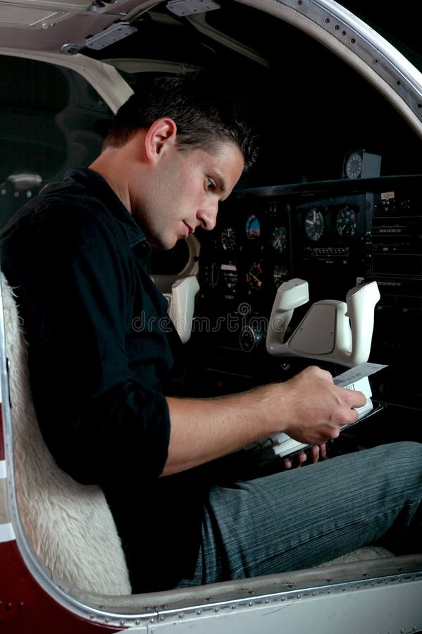 Flight Manual stock image. Image of handsome, aviation - 1240041