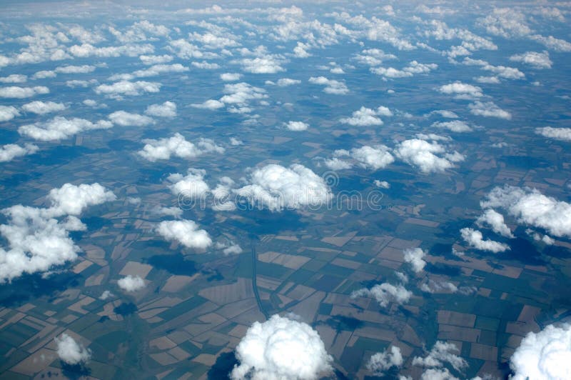 Sparse Fluffy Clouds from Above Stock Photo - Image of plane, cotton ...