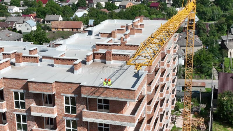 A Flight Over a High-rise Red Brick Building with Inset Windows without ...