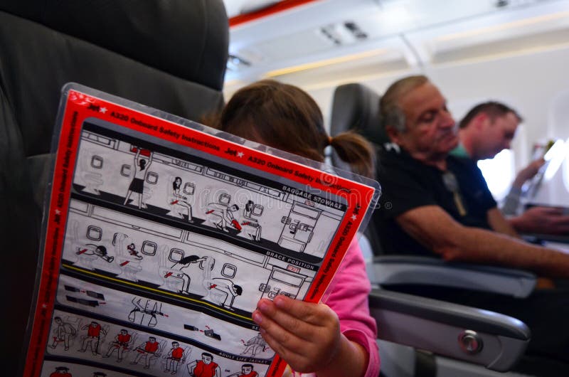 Flight safety instructions editorial photo. Image of interior - 37726051