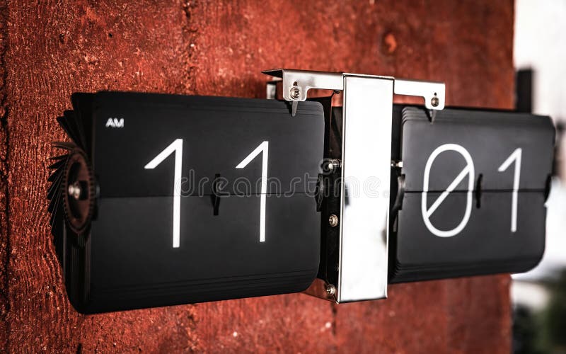 Flip Black Clock with Eleven O Clock Time on Panel Closeup Stock Photo ...