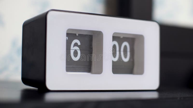 Flip Clock with White Numbers on Black Panel Shows 6 am Stock Video ...