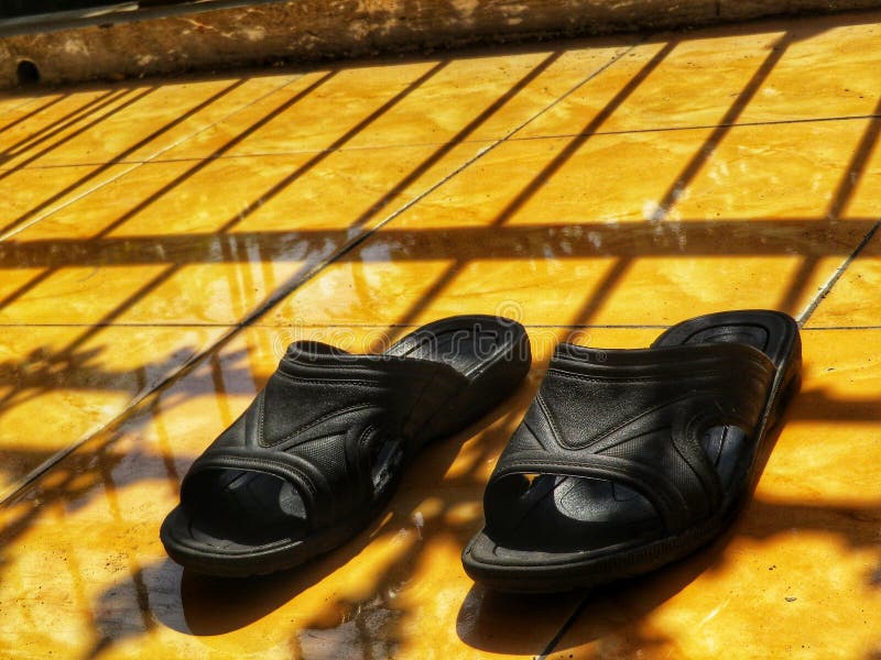 Flip-flops on the Floor, in Front of the House Stock Photo - Image of ...