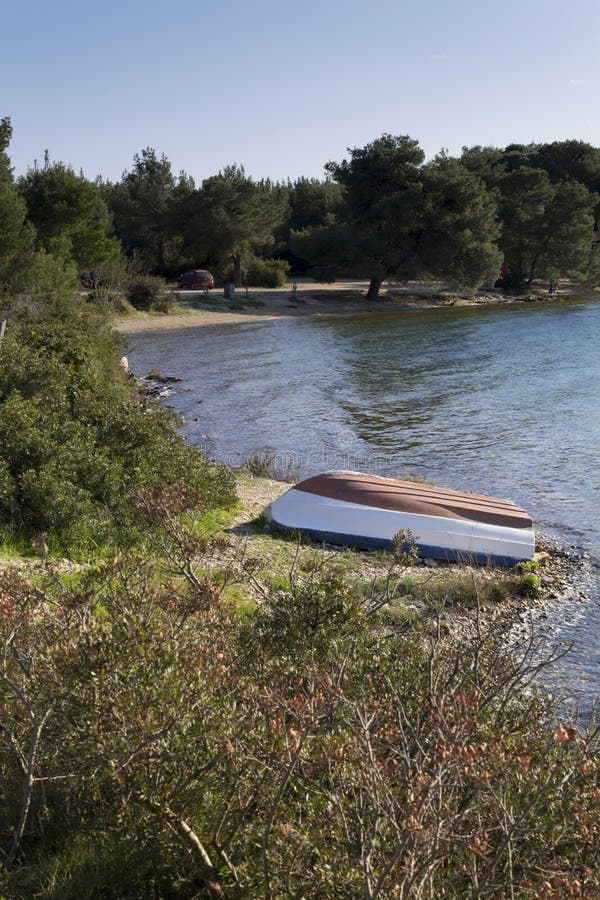 Flipped boat on a coast stock image. Image of turned - 69391227
