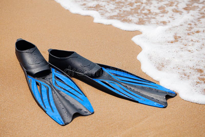 Flippers And Snorkel Lying On A Sandy Beach Stock Photo - Image of ...