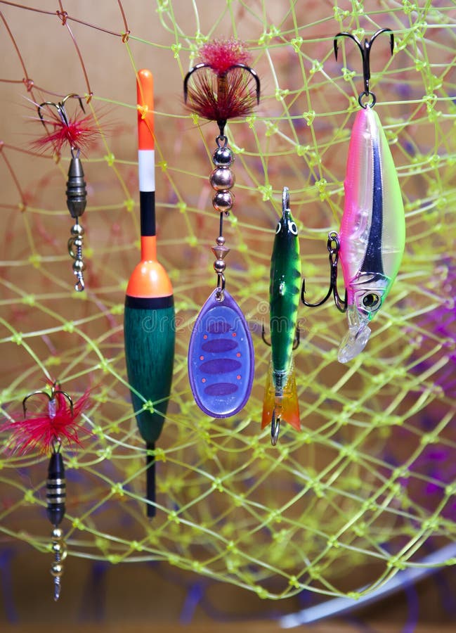 Float and Baits on a Fishing Net Background Stock Image - Image of ...