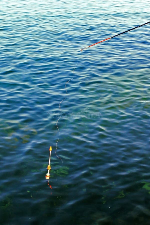 The float fisherman stock image. Image of water, tackle - 53337833