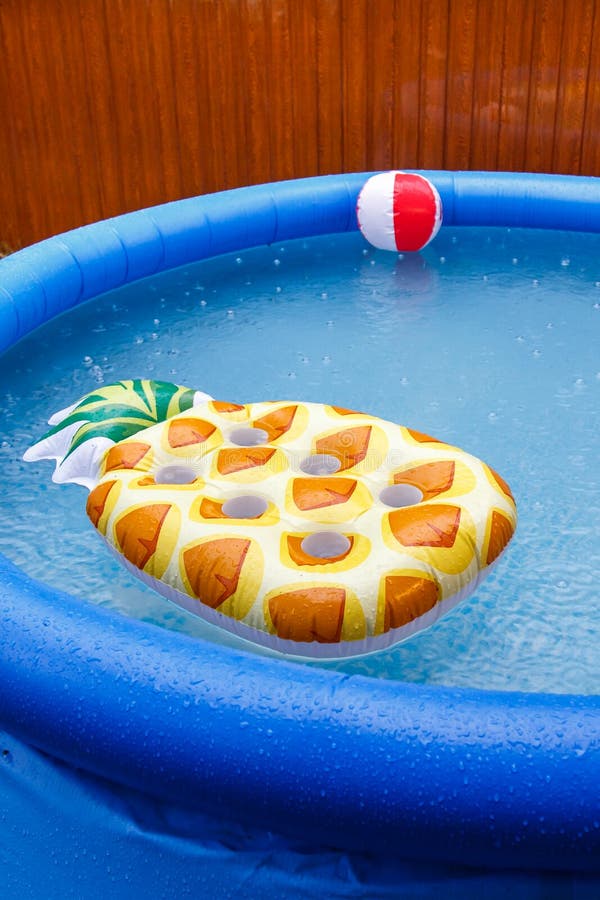 Float Mattresses in the Pool, it S Raining. Stock Photo - Image of pool ...