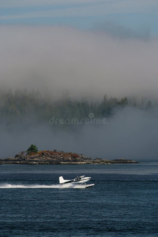 Float Plane Accelerates for Takeoff in Tofino on Vancouver Island in ... Float Plane Accelerates for Takeoff in Tofino on Vancouver Island in ...