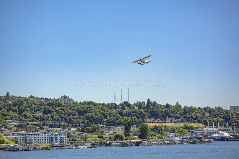 Float Plane Taking Off in Seattle Over Trees Stock Photo - Image of ...