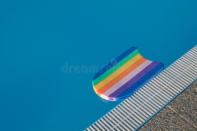 Float in the swimming pool stock photo. Image of colors - 66949960