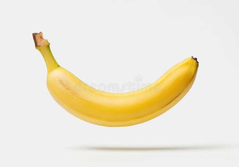 A Floating Banana, Slightly Curved, on a Solid White Background Stock ...