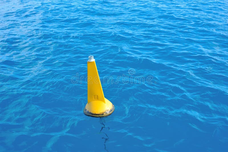 Floating beacon stock photo. Image of yellow, floating - 12599382