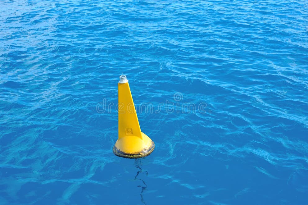 Floating beacon stock photo. Image of yellow, floating - 12599382