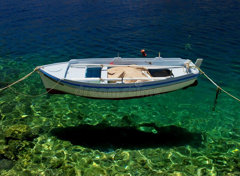 Beautiful Well Maintained Boat Floating on Sea with Its Shadow Visible ...