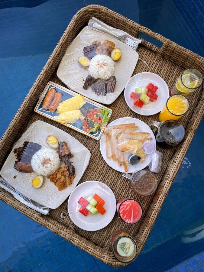 Floating Breakfast Tray in Swimming Pool at Luxury Hotel or Tropical ...