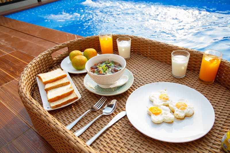 Floating Breakfast Tray in Swimming Pool at Luxury Hotel or Tropical ...