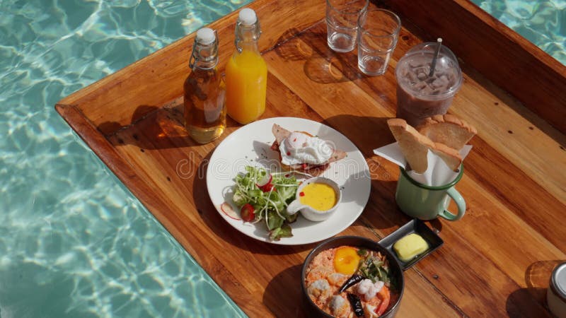 A Floating Breakfast, Basking in the Sun S Embrace . Stock Video ...