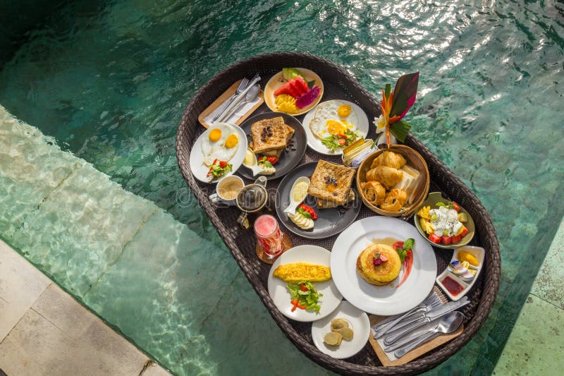 Floating Breakfast Tray in Swimming Pool at Luxury Hotel or Tropical ...
