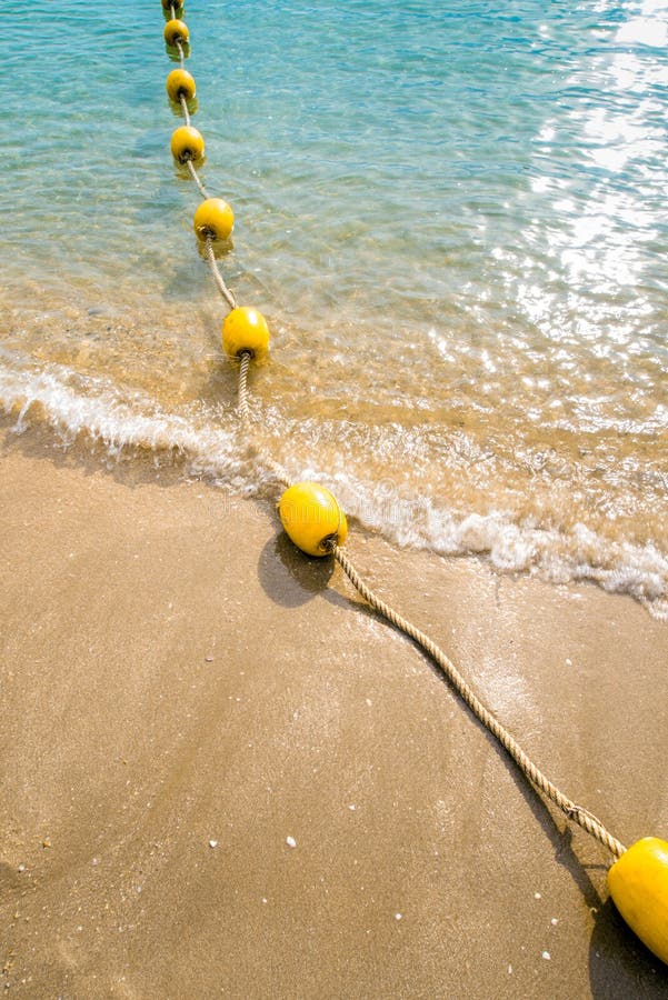 Floating Buoy and Rope Dividing the Area on Beach Stock Image - Image ...
