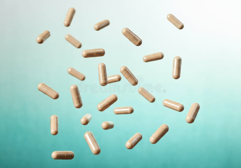 Floating Capsules Representing Health Wellness Supplements Stock Photos ...
