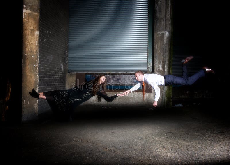 Woman Standing Over a Defeated Man Stock Photo - Image of defeat ...