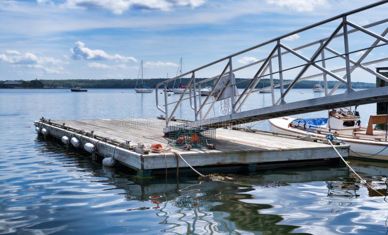 Floating Dock with Lobster Trap Stock Photo - Image of railings ...