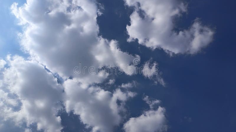 Floating Dreams in a Deep Blue Sky Stock Photo - Image of horizon ...