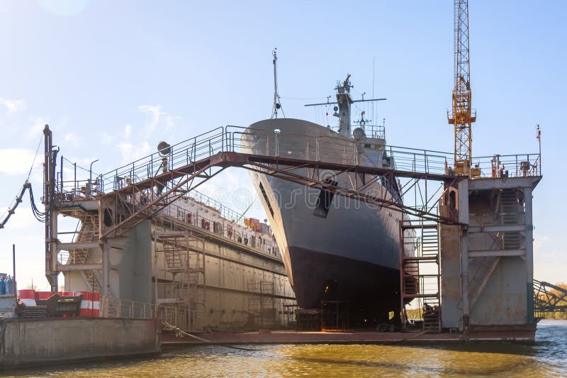 Floating Dry Dock with a Ship Under Repair Maintenance Inside Stock ...