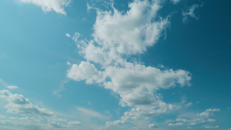 Floating Fluffy Clouds. Beautiful Sunny Blue Sky with Wispy Smoky White ...