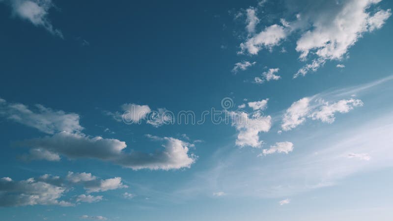 Floating Fluffy Clouds. Beautiful Sunny Blue Sky with Wispy Smoky White ...