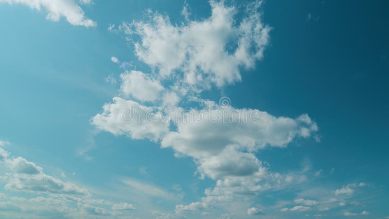 Floating Fluffy Clouds. Beautiful Sunny Blue Sky with Wispy Smoky White ...