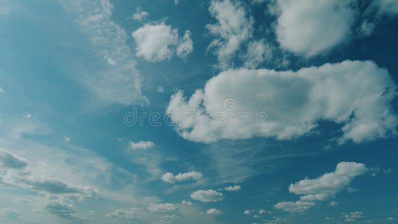 Floating Fluffy Clouds. Two Layers of Cloudiness. Blue Summer Sky with ...
