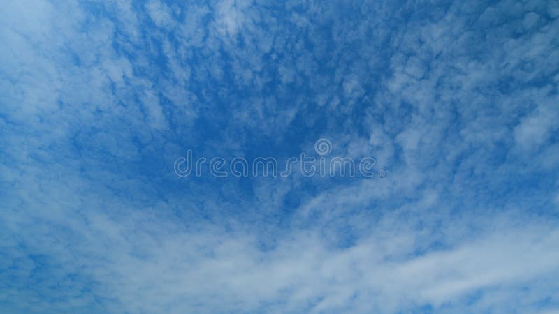 Floating Fluffy Clouds. Two Layers of Cloudiness. Blue Summer Sky with ...