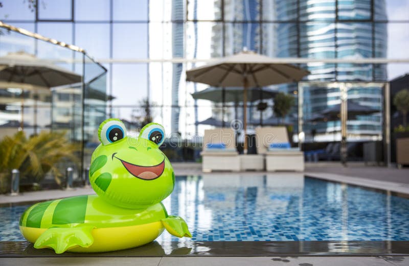 Floating Toy Frog in Child Pool Stock Image - Image of blow, childhood ...