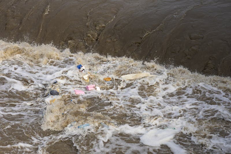 Floating Garbage and Debris Swept by Powerful River Currents after ...