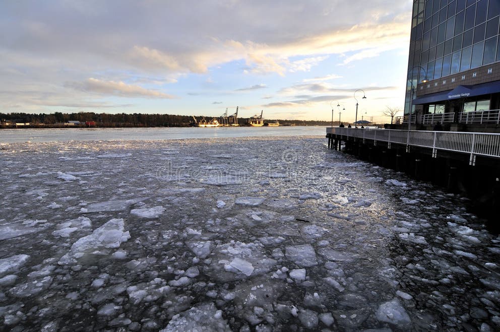 Floating Ice by the Building Stock Photo - Image of cloud, building ...