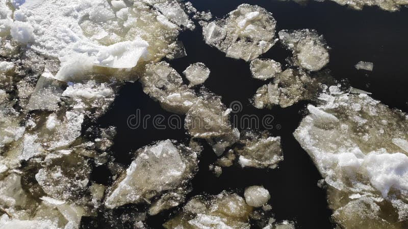 Floating Ice at River. Spring River Shore with Ice Stock Photo - Image ...