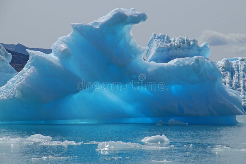 Floating Iceberg - Blue Ice Stock Photo - Image of iceberg, freezing ...
