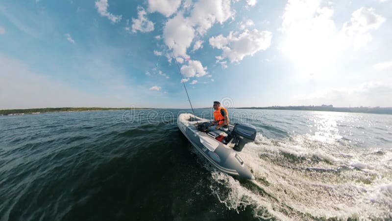 Inflatable Boat with a Man Sitting in it in a Top View Stock Video ...